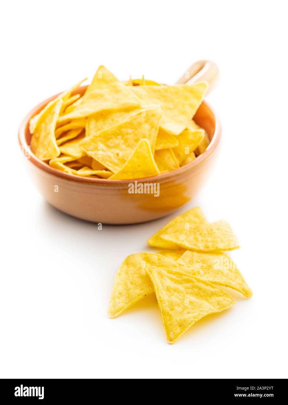 Corn nacho chips. Yellow tortilla chips in bowl isolated on white ...