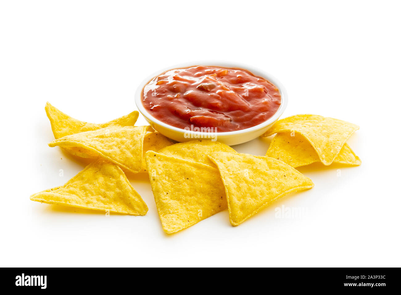 Corn nacho chips and tomato dip. Yellow tortilla chips isolated on ...