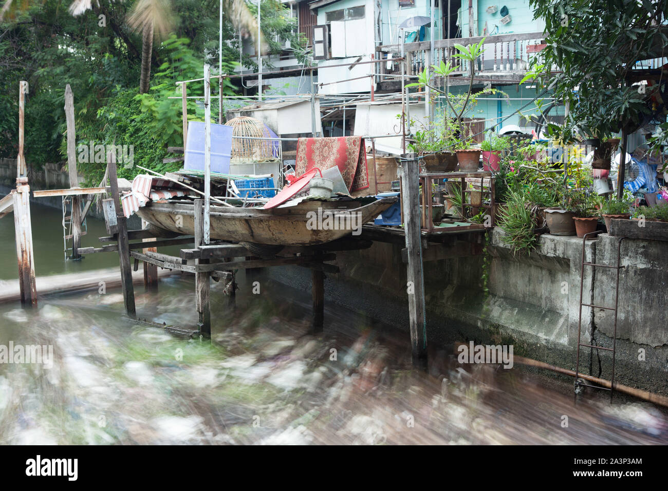 Garbage floating in water in Bangkok Stock Photo - Alamy
