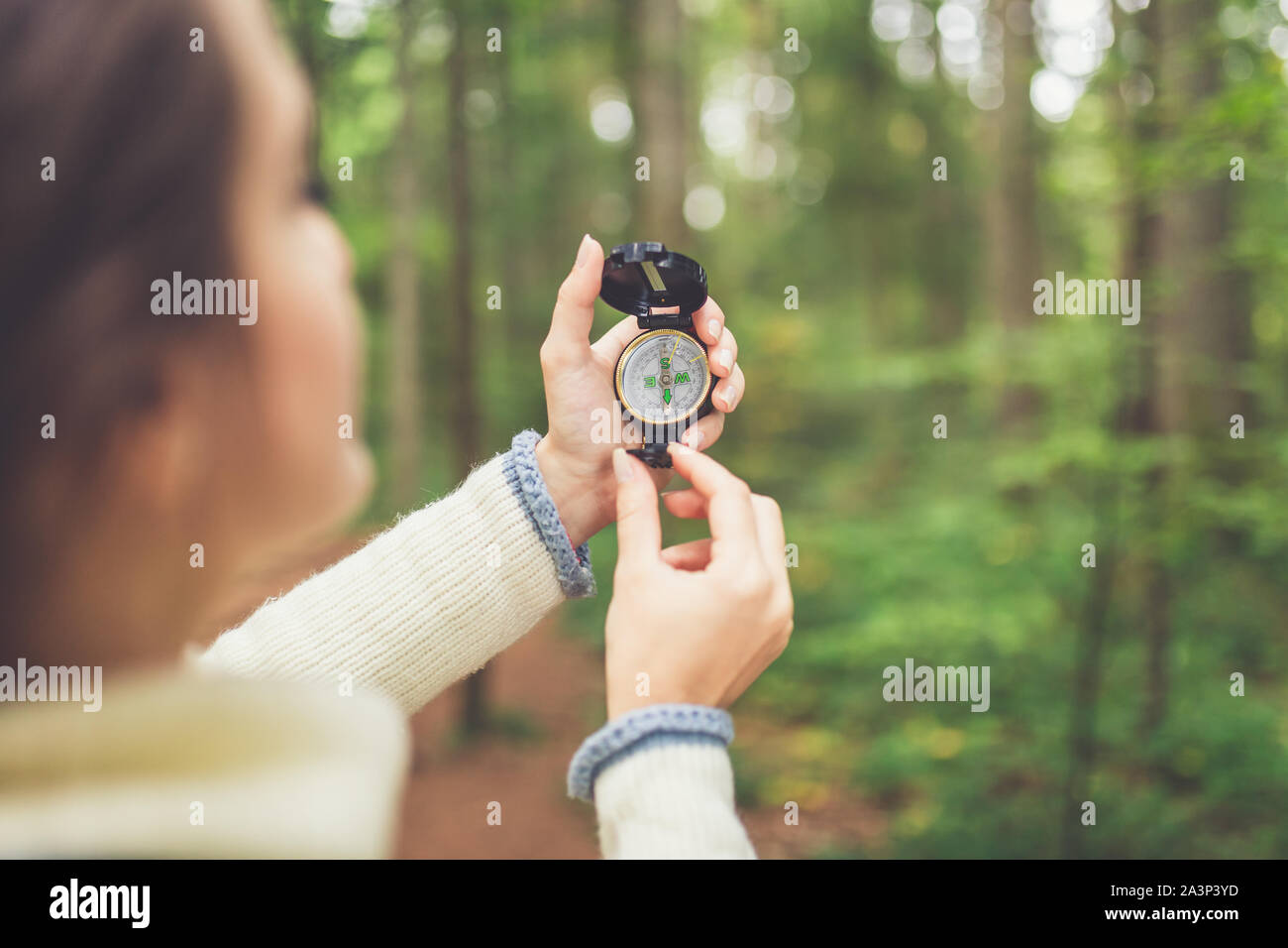 Orienteering compass girl hi-res stock photography and images - Alamy
