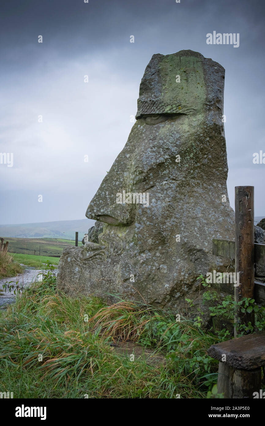The Whirlaw Wizard Sculpture sits below, The Bridestones, Gritstone ...