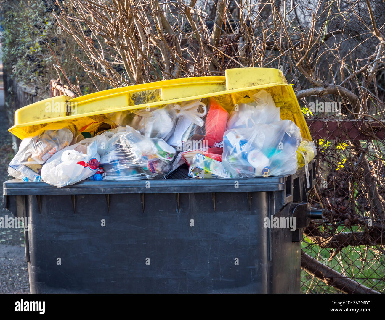 Garbage can with plastic Stock Photo - Alamy