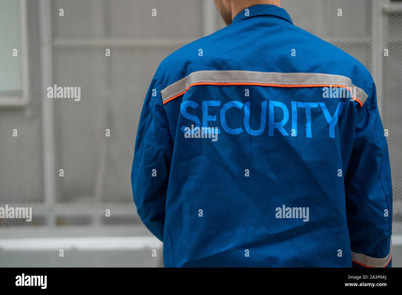 close up man person in uniform with words "security guard" on it Stock ...
