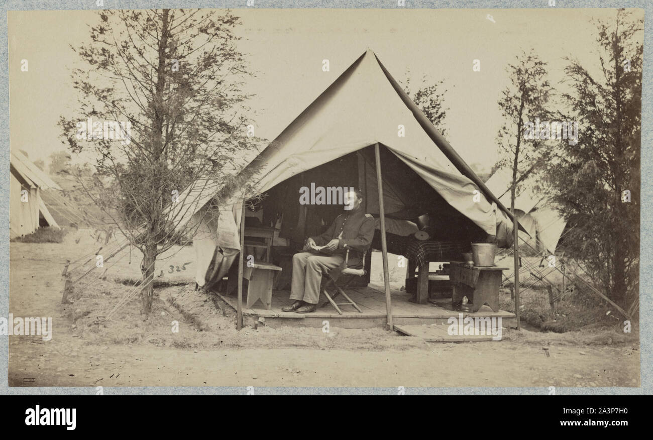 Soldier sitting inside his tent Stock Photo - Alamy
