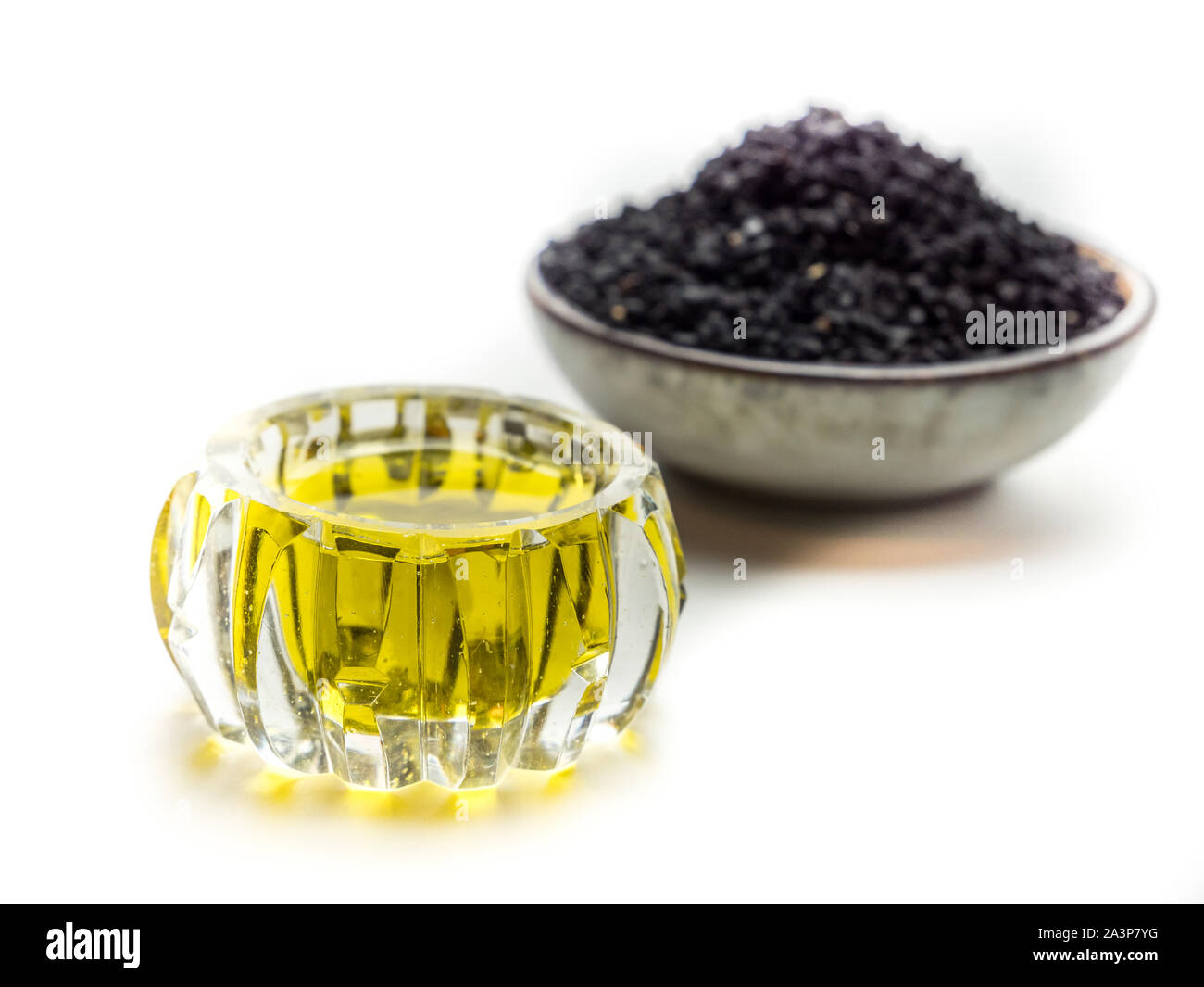 Isolated black cumin oil Stock Photo - Alamy
