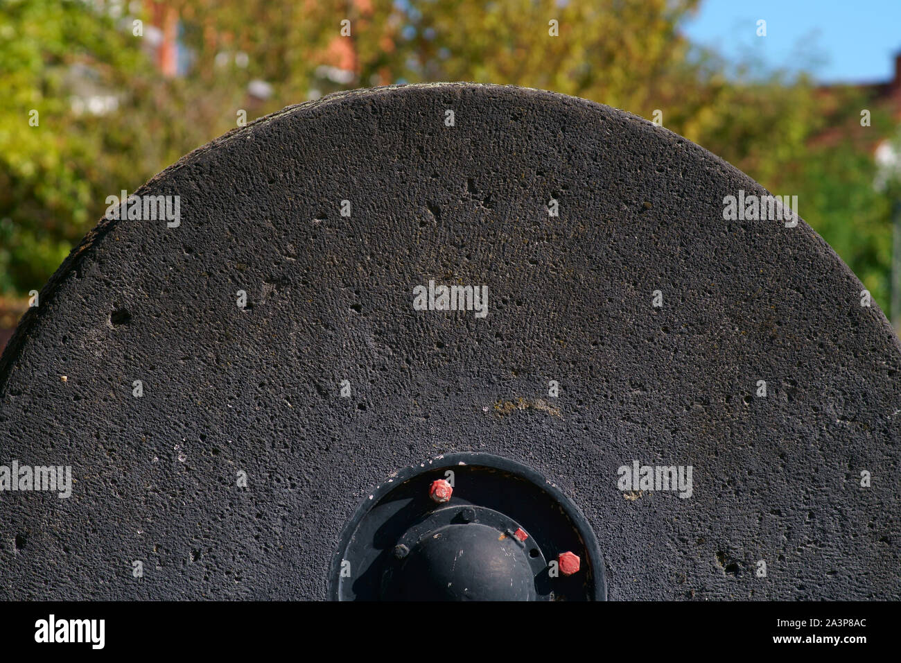 The close-up of a heavy millstone Stock Photo - Alamy