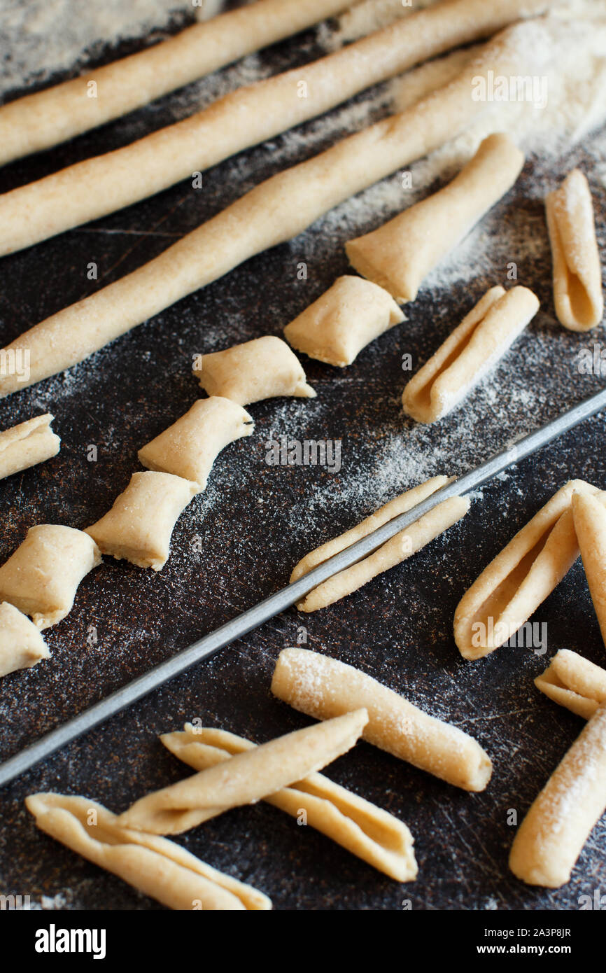 Making whole wheat flour pasta Maccheroni from Puglia, Italy Stock ...