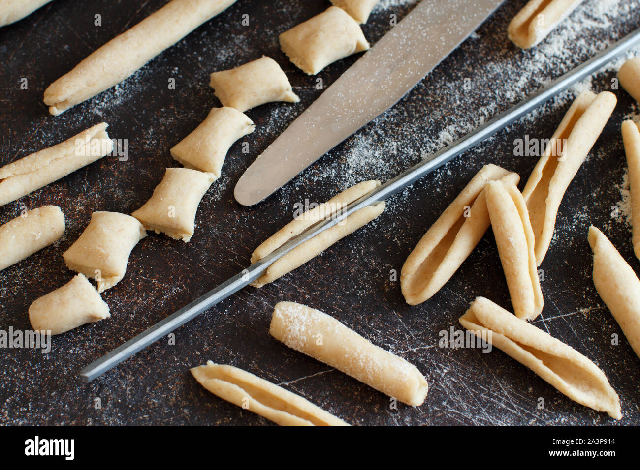 Making whole wheat flour pasta Maccheroni from Puglia, Italy Stock ...