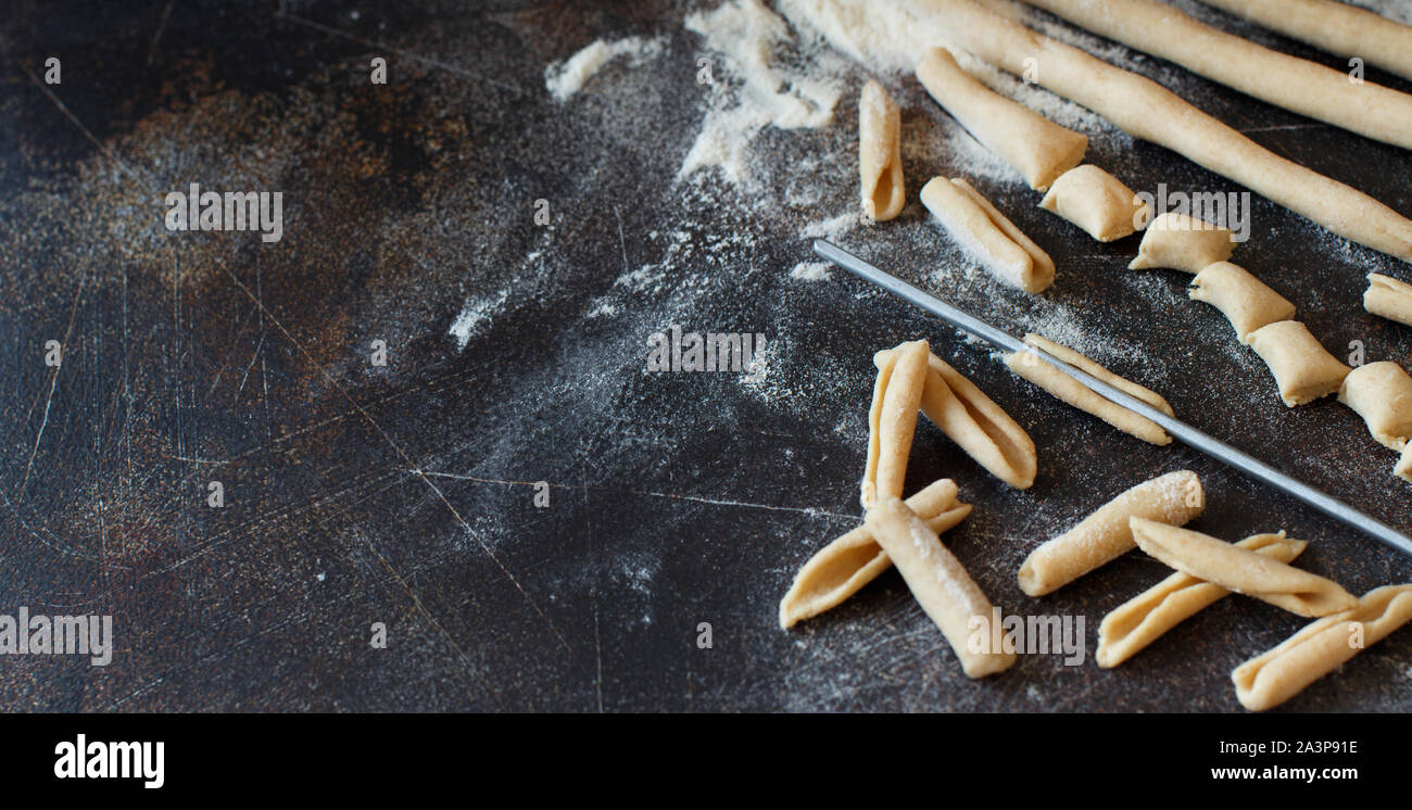 Making whole wheat flour pasta Maccheroni from Puglia, Italy Stock ...