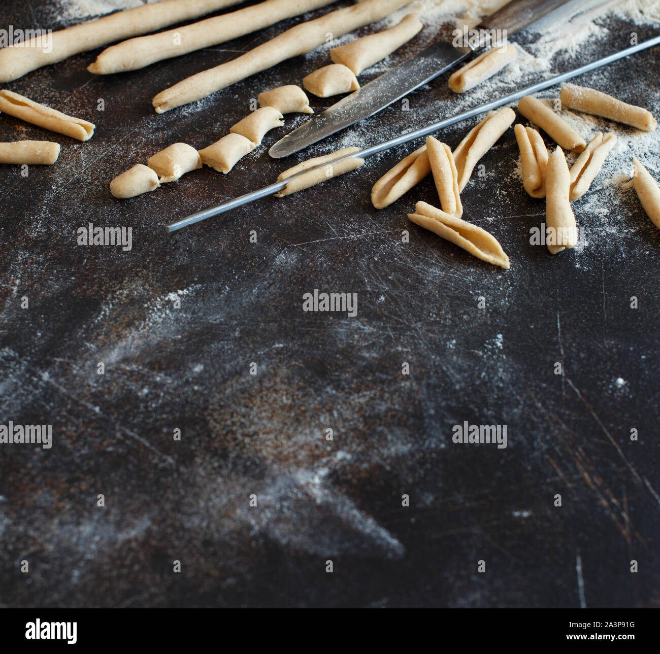 Making whole wheat flour pasta Maccheroni from Puglia, Italy Stock ...