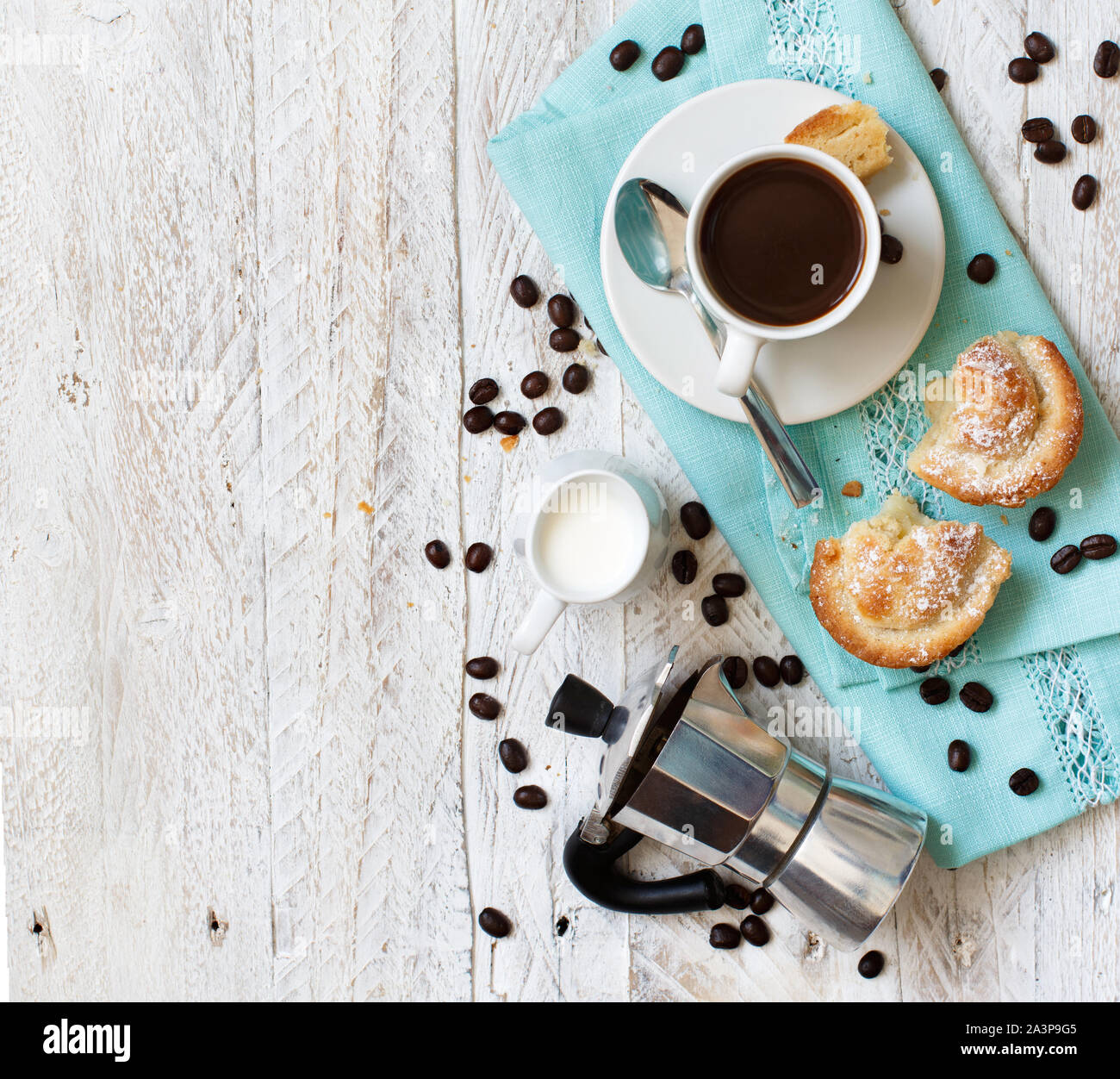 Cup of coffee with pasticciotto pastry on a rustic background top view ...