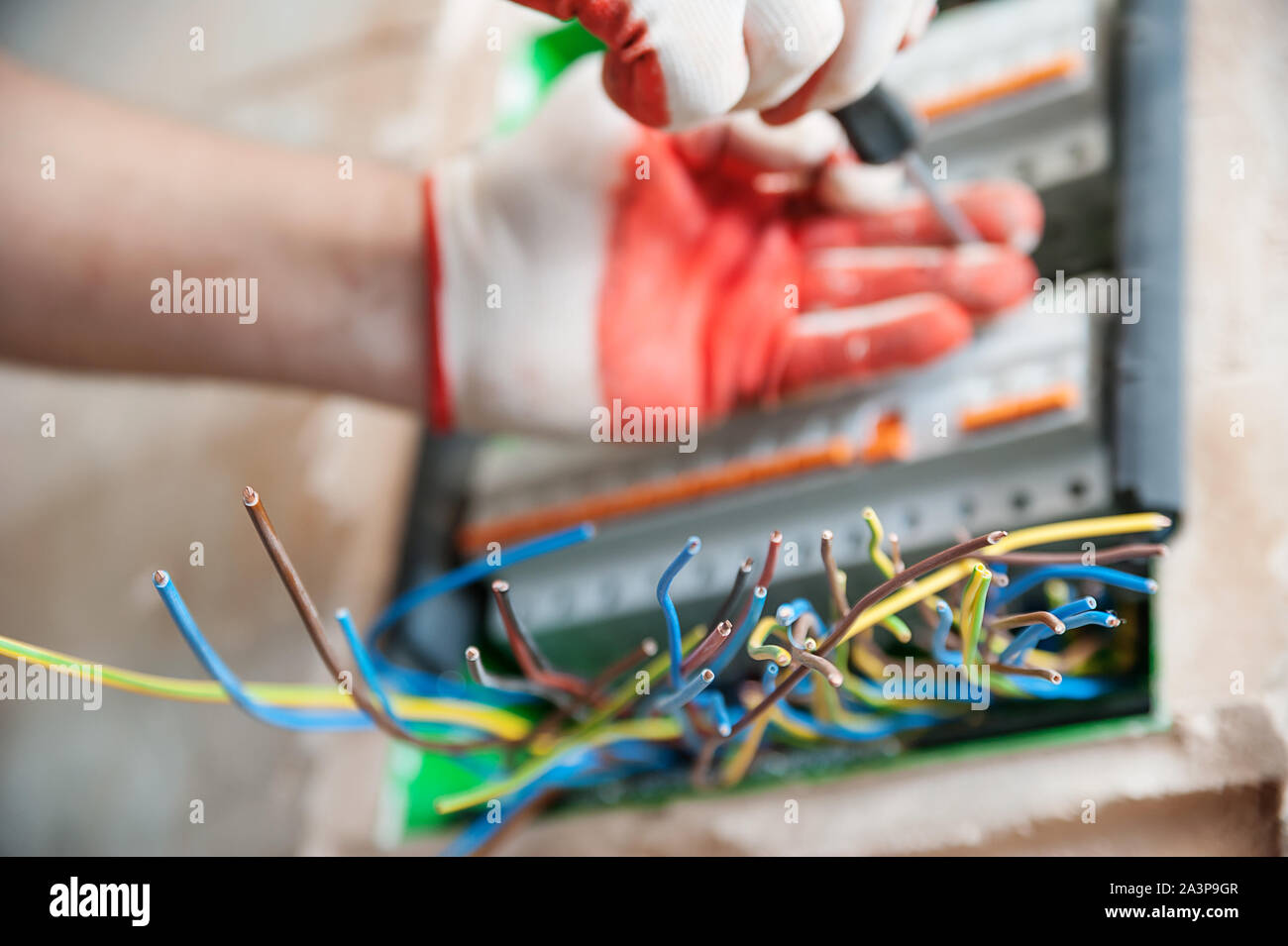 The electric wires are sticking out of the switch box Stock Photo - Alamy