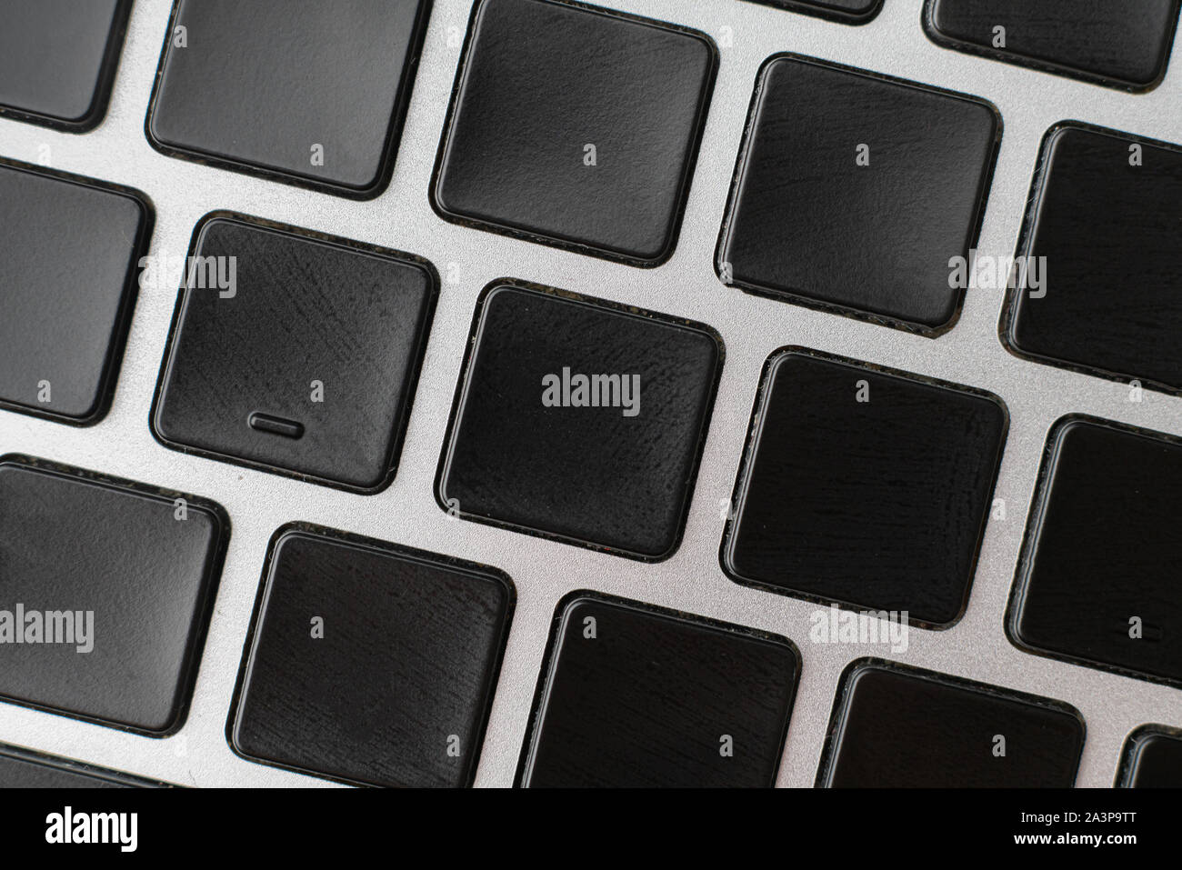 macro shot of empty blank keys on a keyboard without letter Stock Photo ...