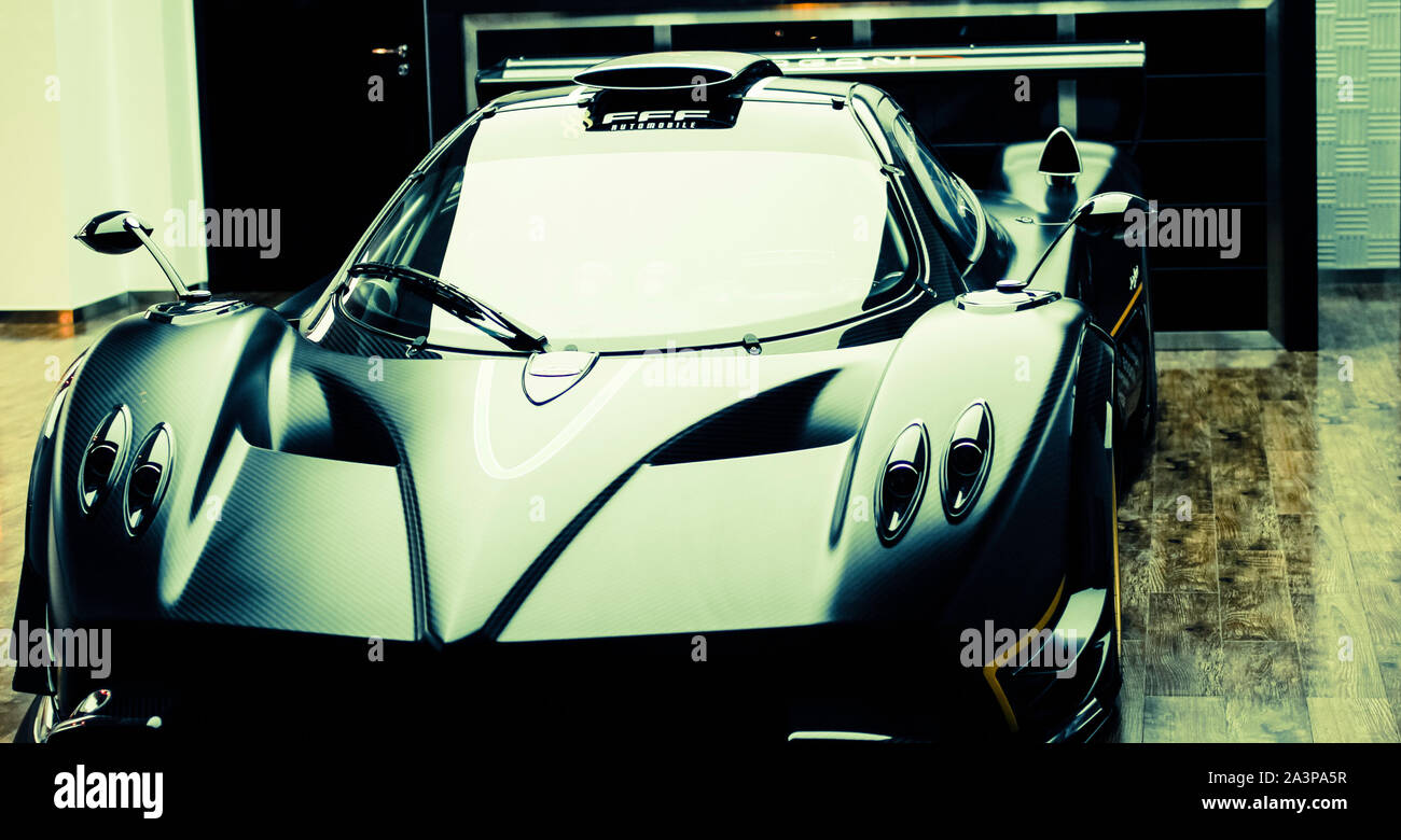 super luxurious sports car in a shop front in beijing Stock Photo - Alamy