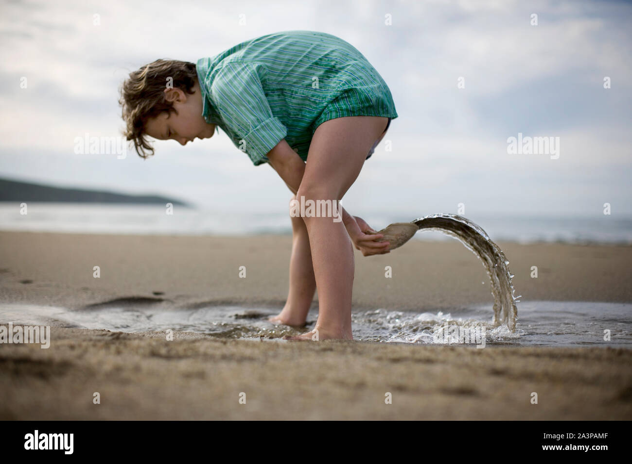 Scooping sand hi-res stock photography and images - Alamy