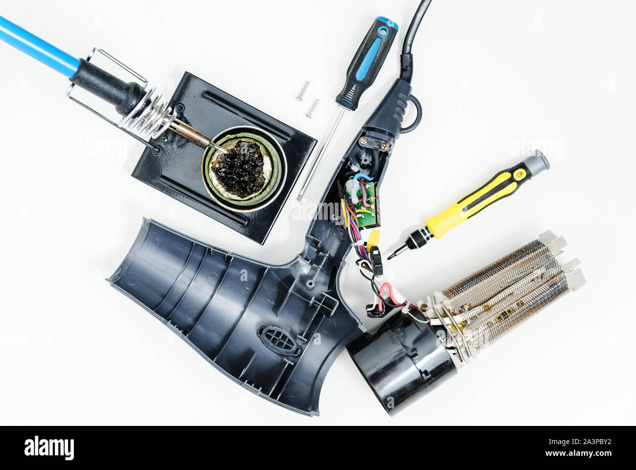 Hairdryer in a disassembled condition on a white background Stock Photo ...