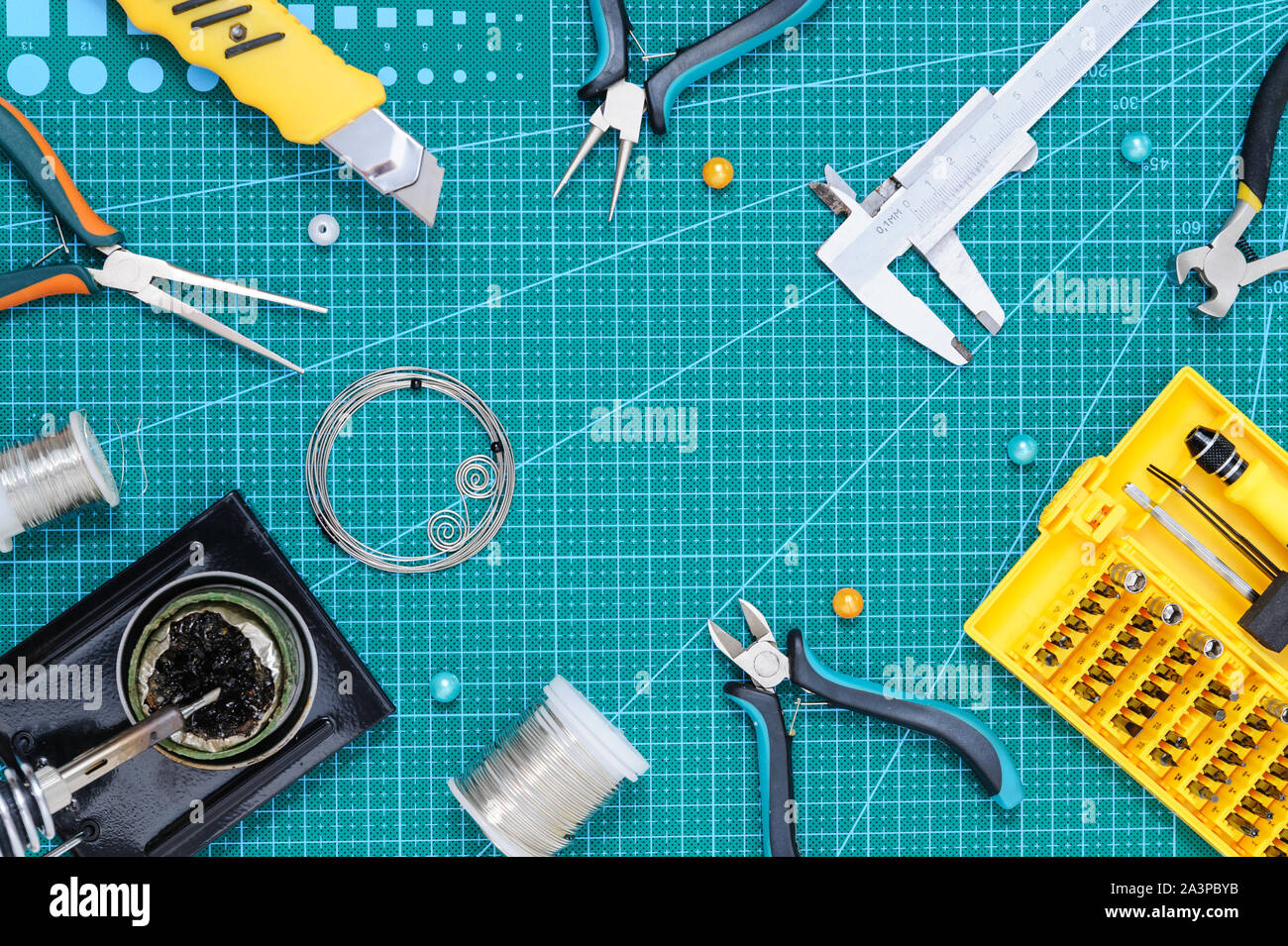 Still life with tools for handmade on the work pad Stock Photo - Alamy