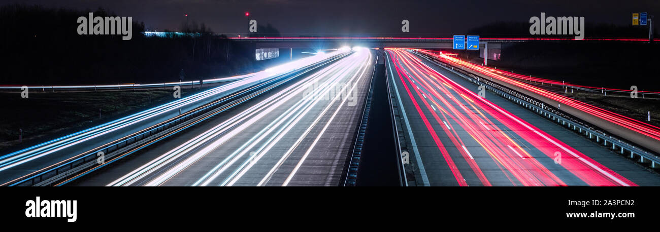 Panorama Night traffic on highway Stock Photo - Alamy