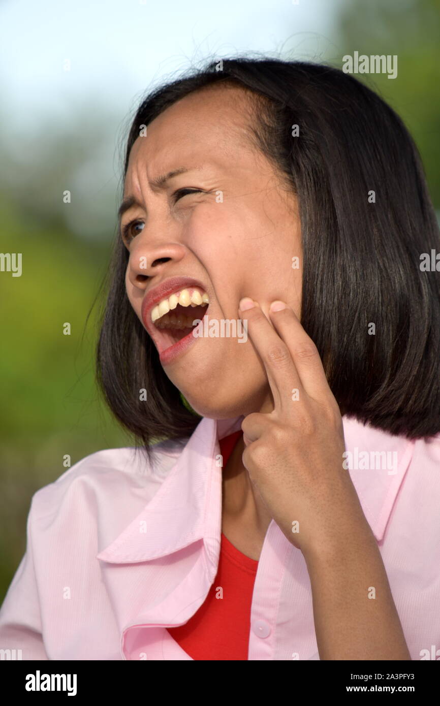 An Attractive Adult Female With Toothache Stock Photo - Alamy