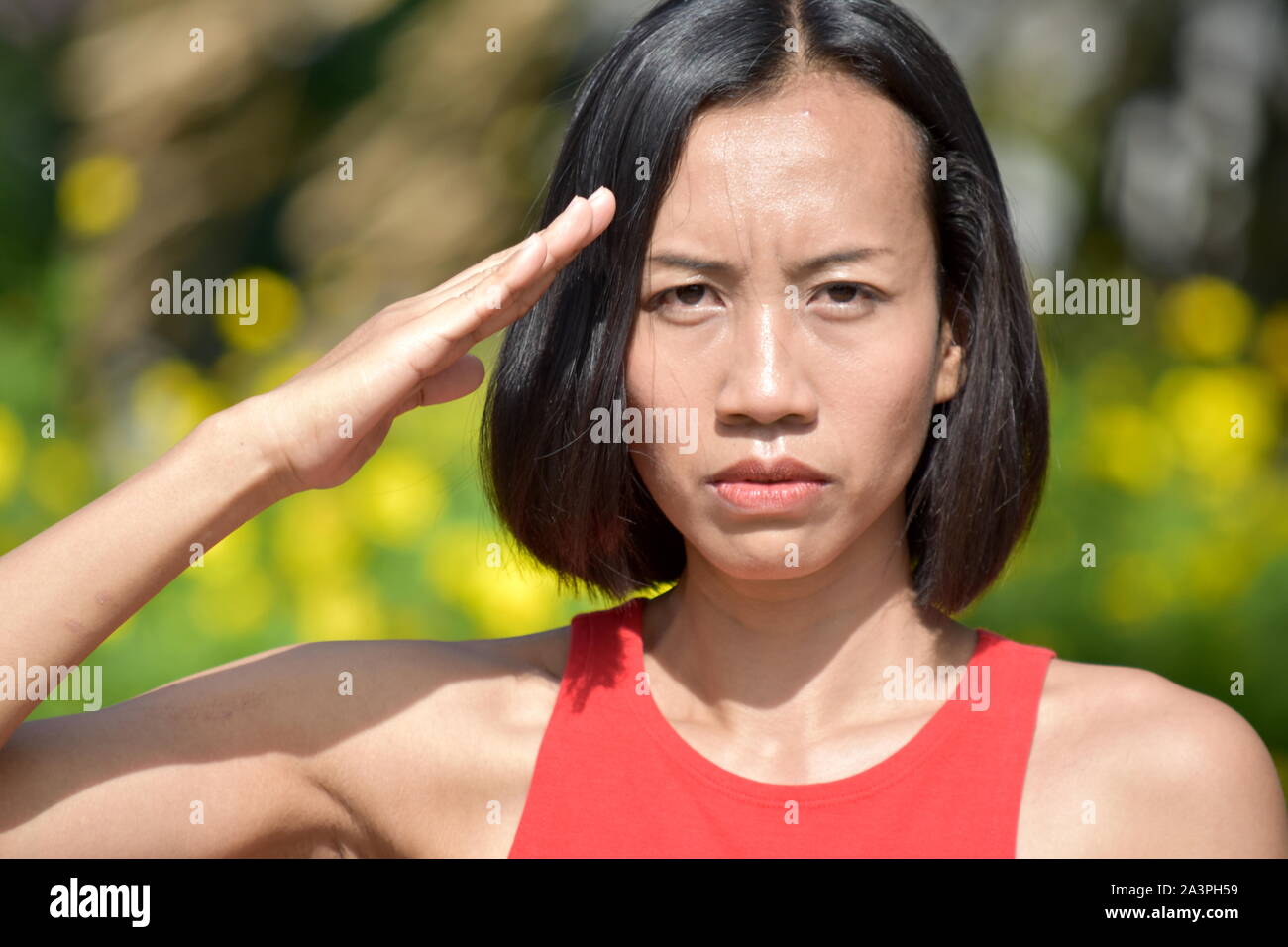 An Adult Female Saluting Stock Photo - Alamy