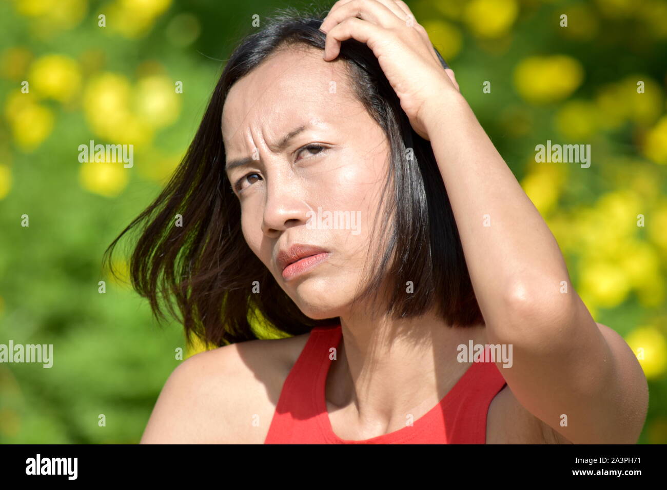Confused Attractive Asian Adult Female Stock Photo - Alamy