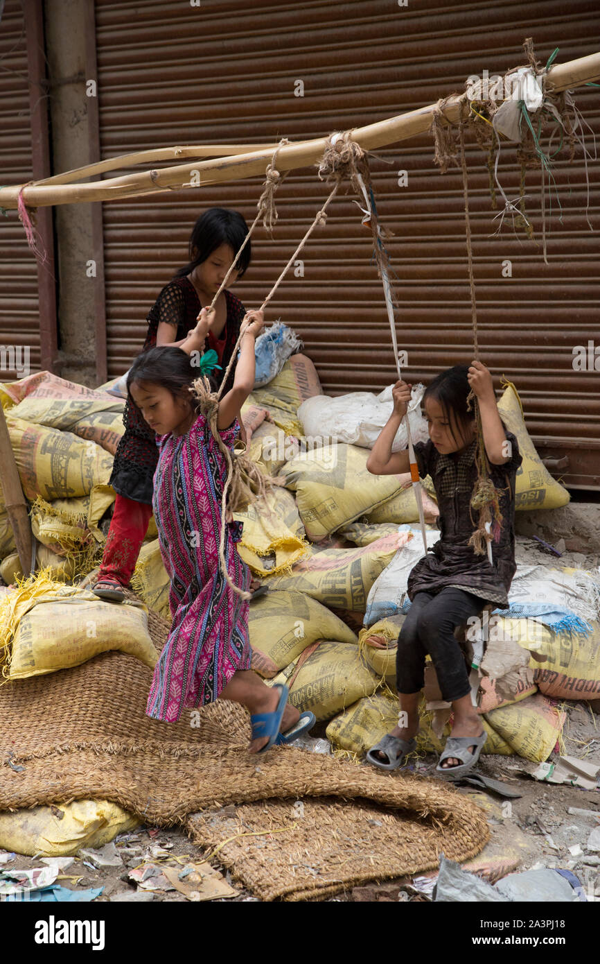 Poor Girls playing on street, Kathmandu, Nepal Stock Photo - Alamy