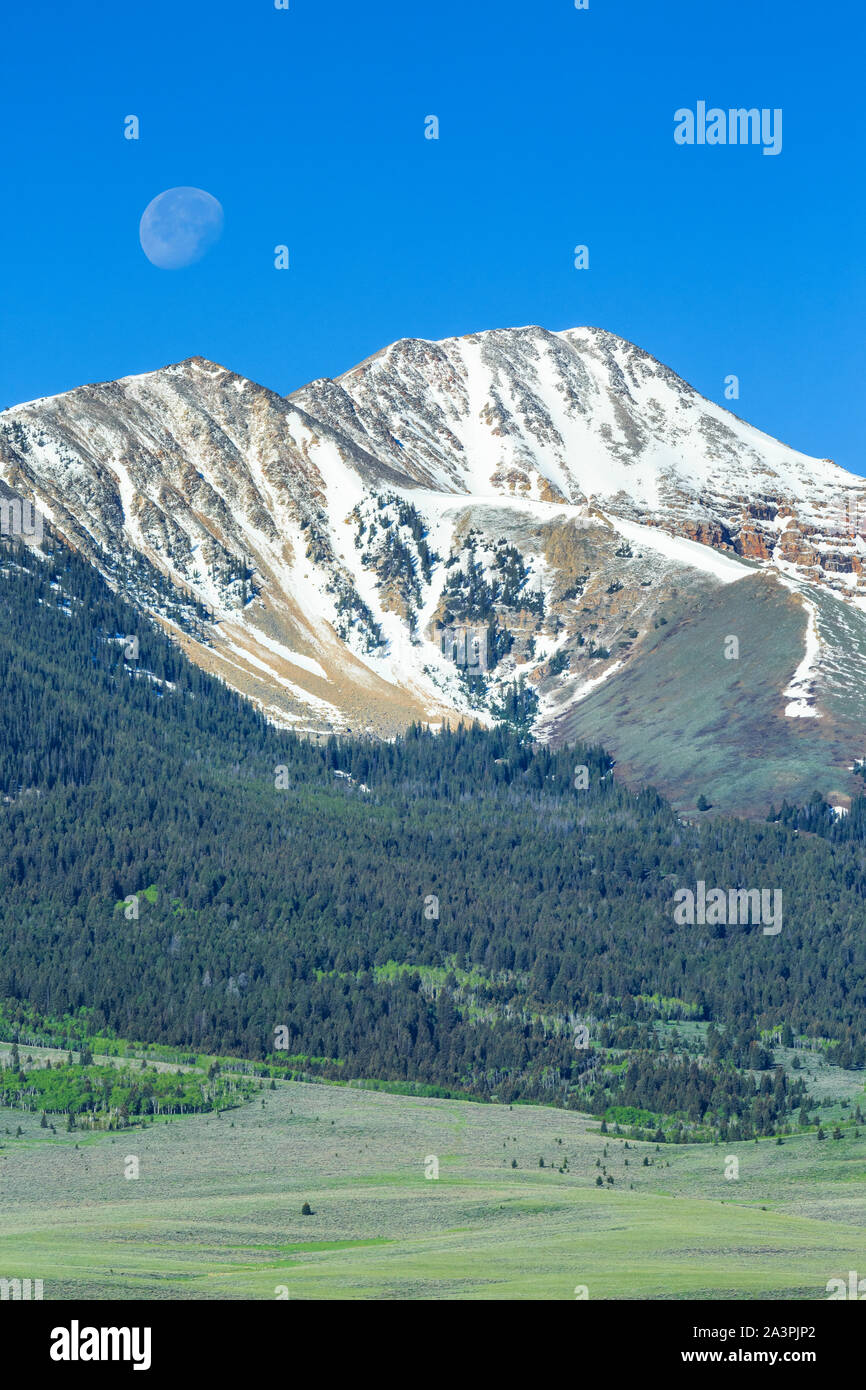 moon setting over lima peaks near lima, montana Stock Photo - Alamy