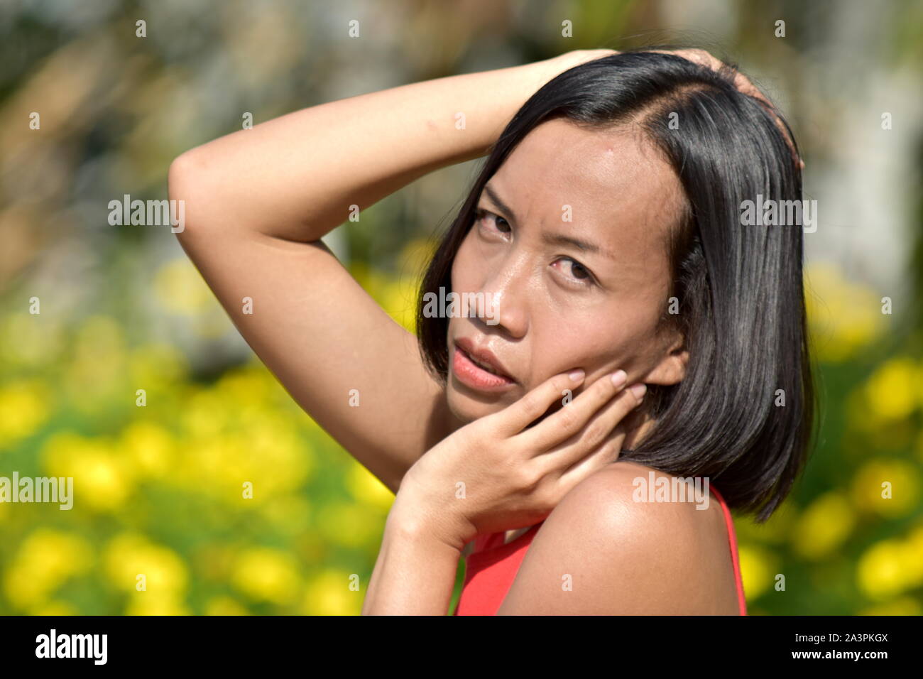 An Aching Asian Female Woman Stock Photo - Alamy
