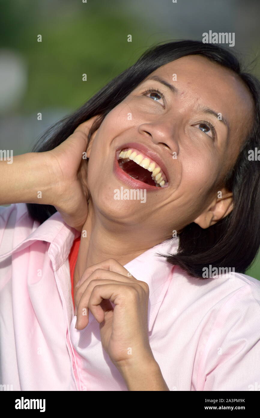 Beautiful Filipina Female Laughing Stock Photo - Alamy