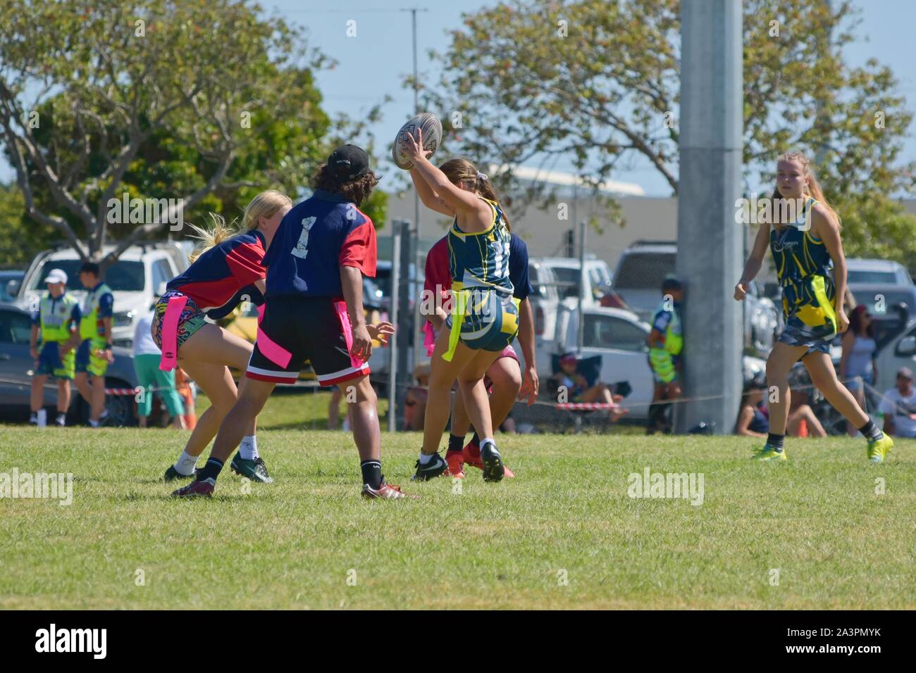 Editorial photo of teenager playing a game of Oztag Stock Photo - Alamy