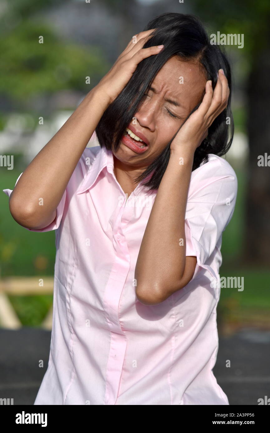 Stressed Young Filipina Person Stock Photo - Alamy