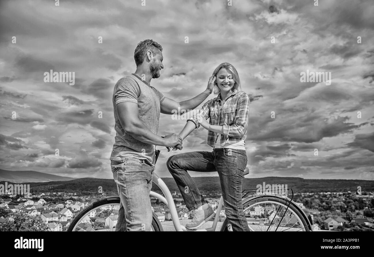 How to meet girls while riding bike. Man with beard and shy blonde lady ...