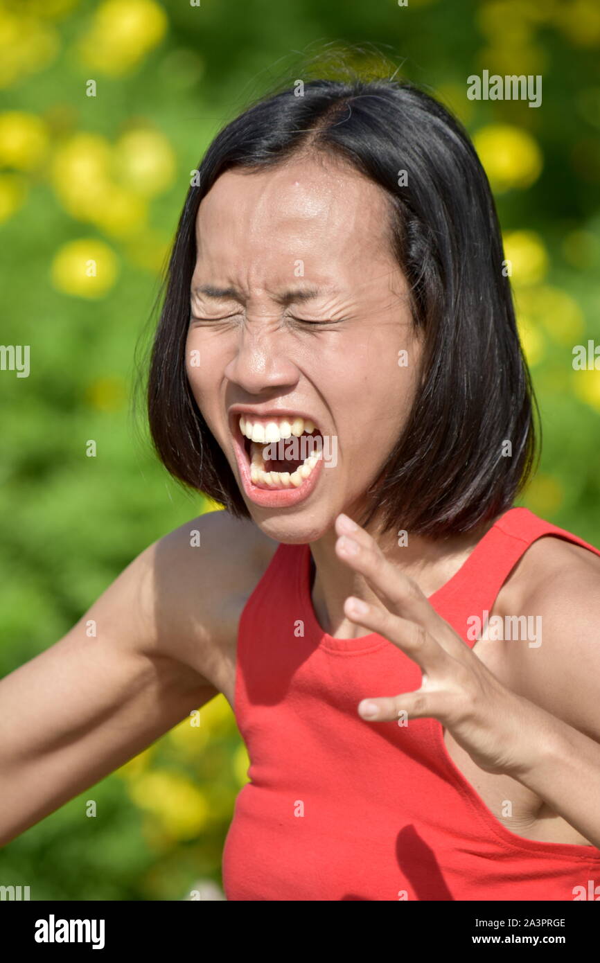 Stressed Youthful Asian Adult Female Stock Photo - Alamy