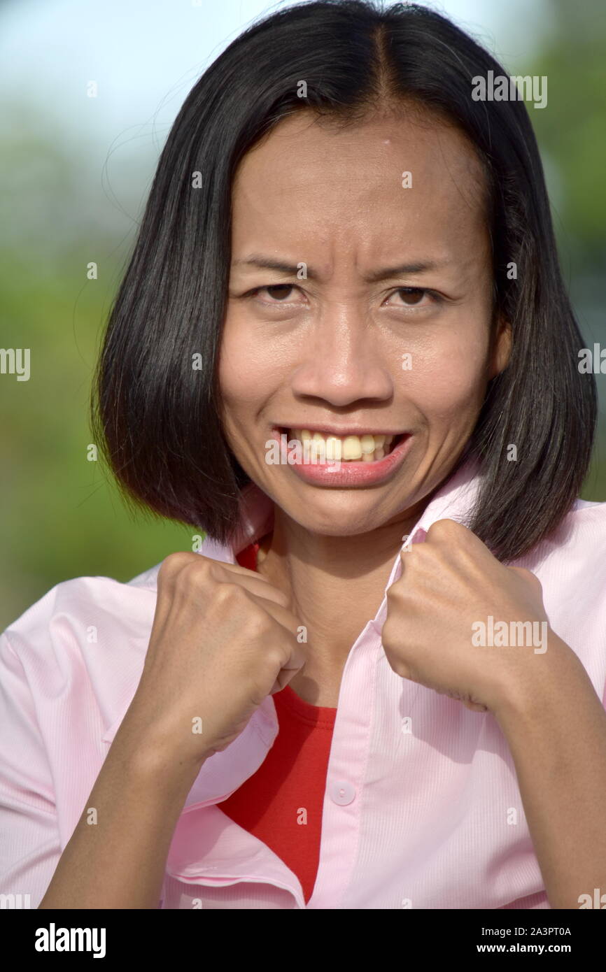 An Upset Pretty Asian Woman Stock Photo - Alamy