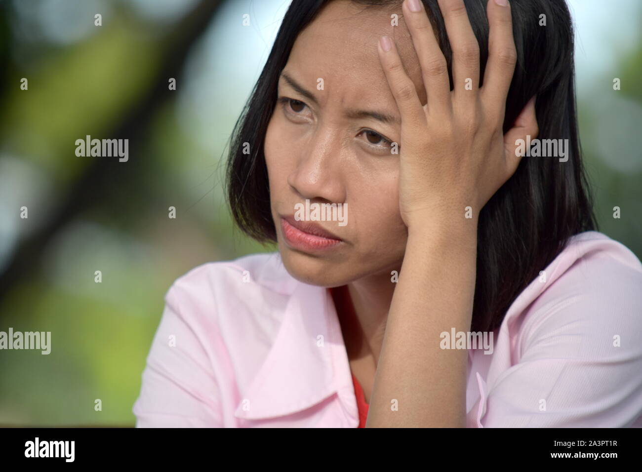 Worried Attractive Asian Female Stock Photo - Alamy