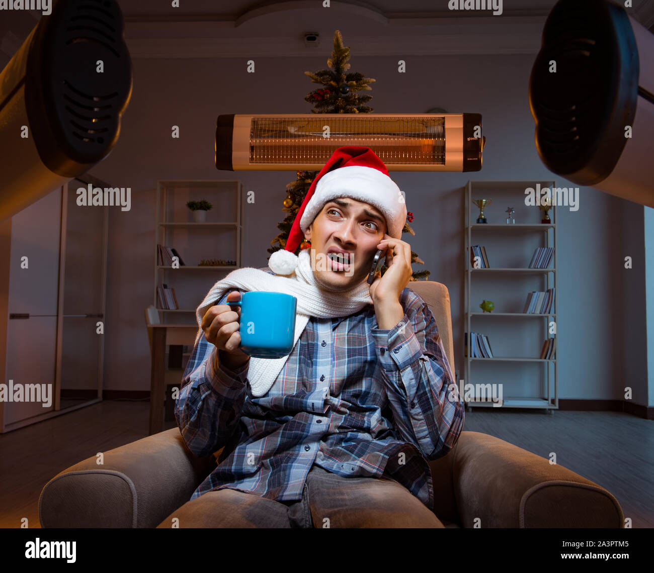 The man suffering from cold at home Stock Photo - Alamy