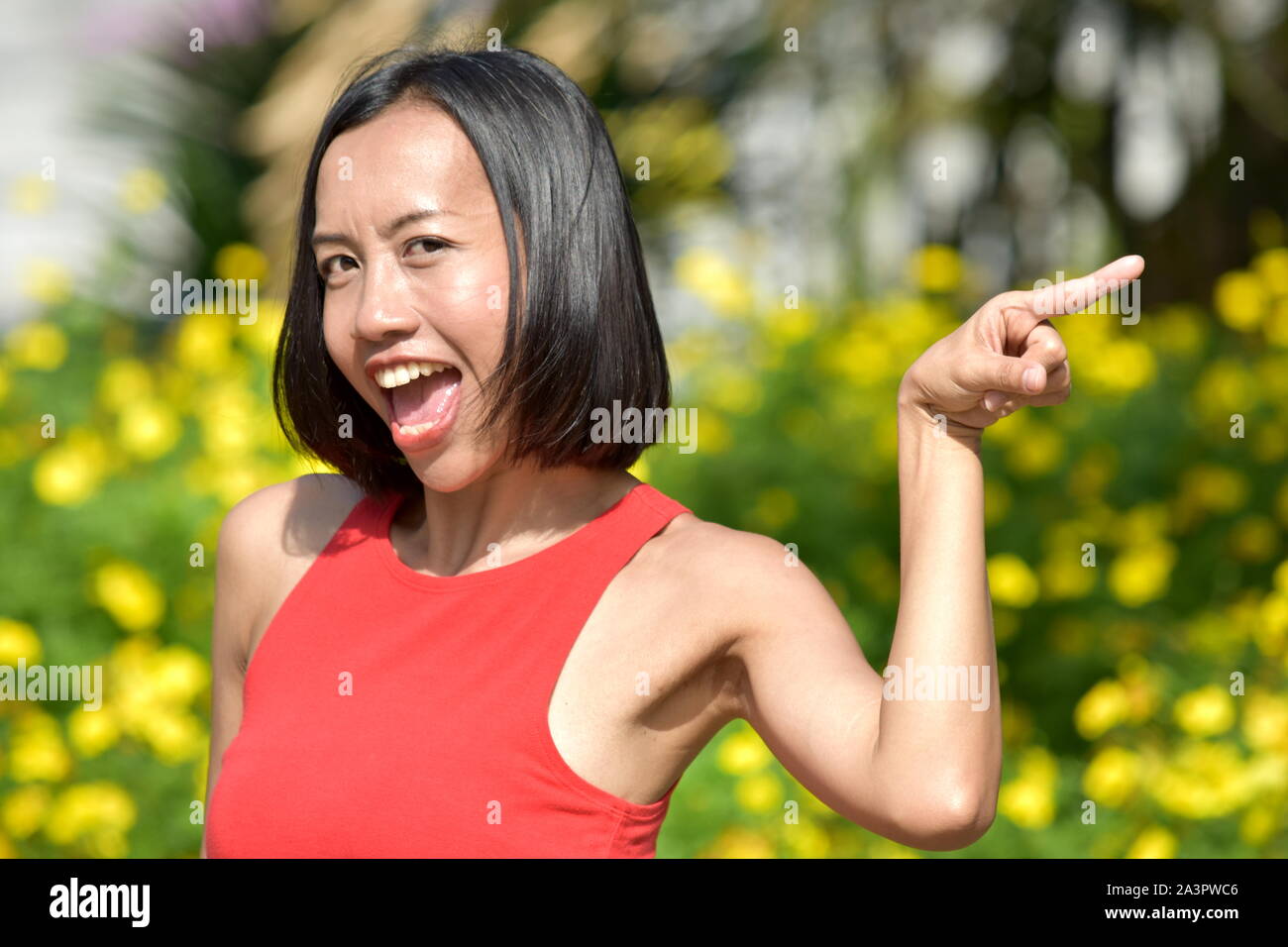 Minority Woman Pointing Stock Photo - Alamy