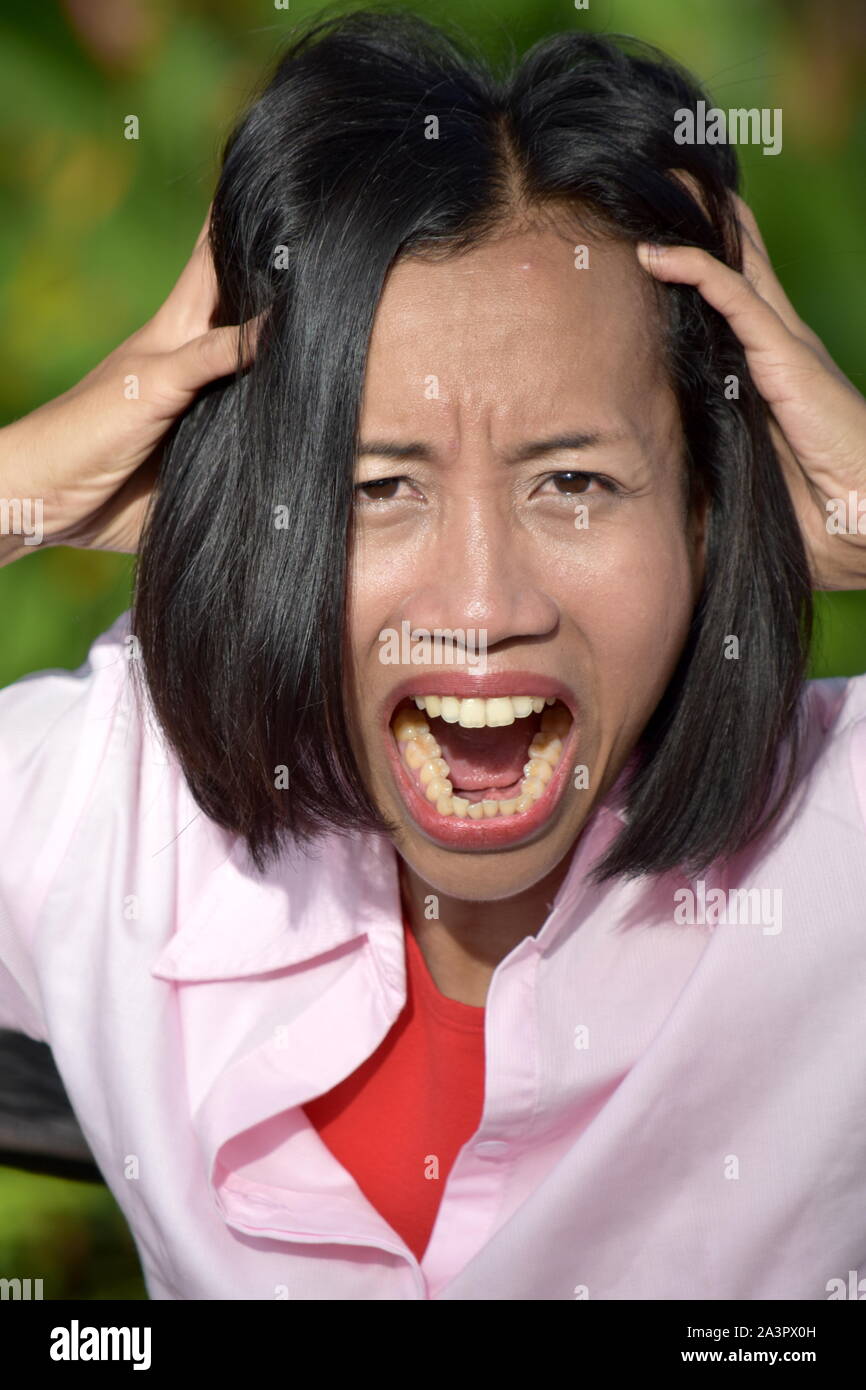 An Anxious Diverse Female Stock Photo - Alamy