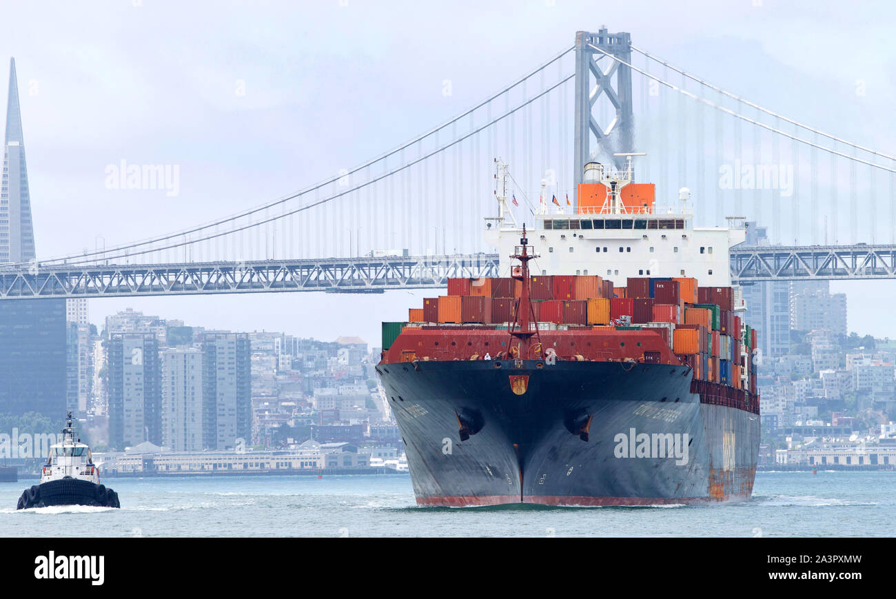 Oakland, CA - July 08, 2019: Tugboats assisting Cargo Ship TOKYO ...