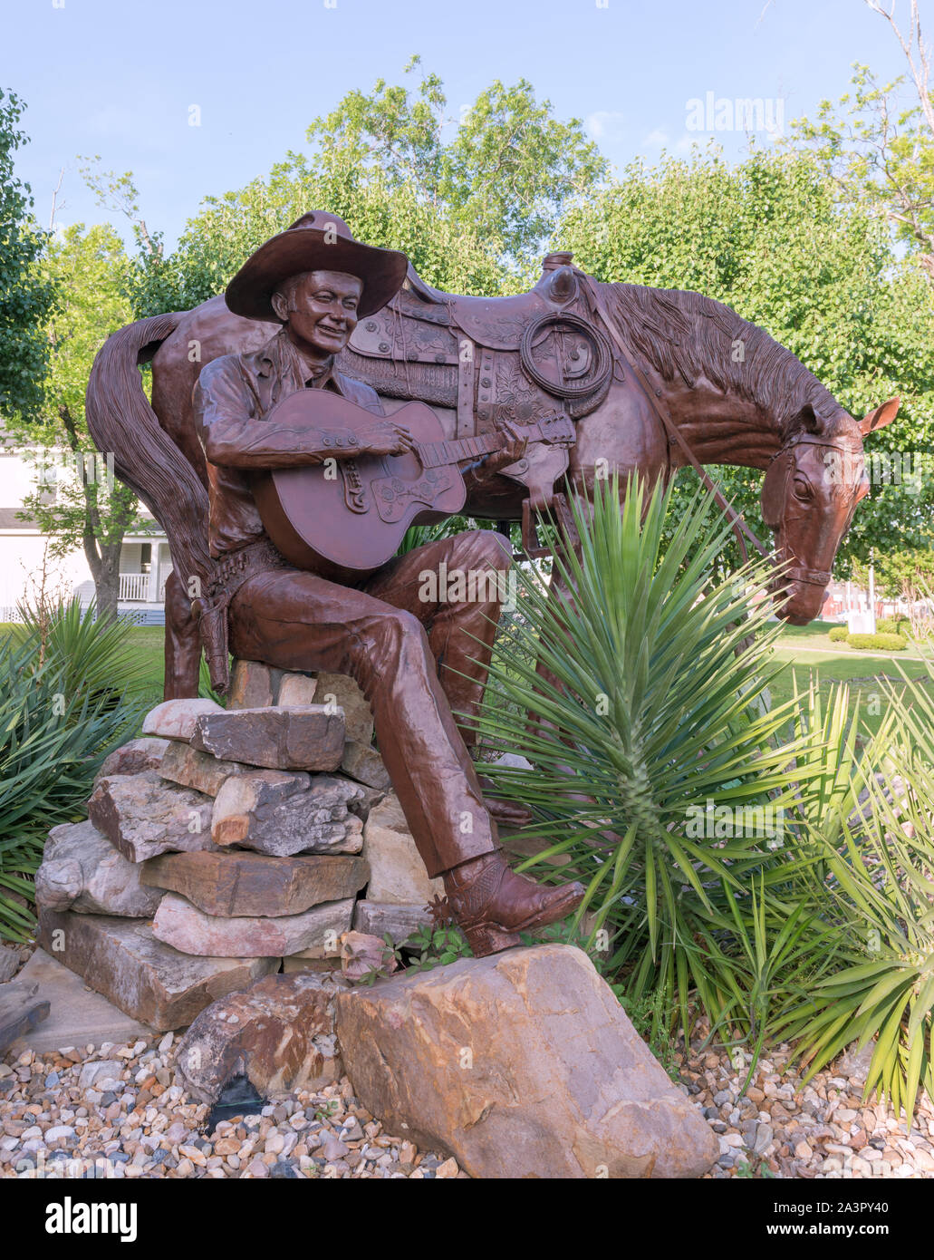 Statue of Tex Ritter, an early singing cowboy, outside the Texas ...