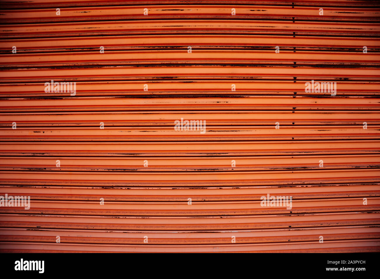 Red metal shutter door texture background Stock Photo - Alamy