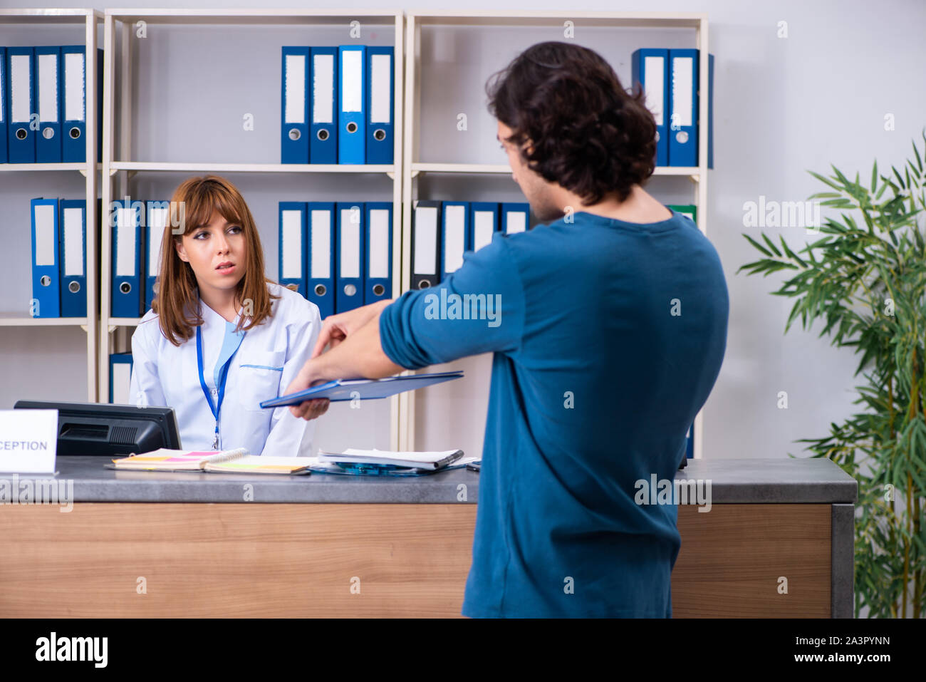Hospital reception angry hi-res stock photography and images - Alamy