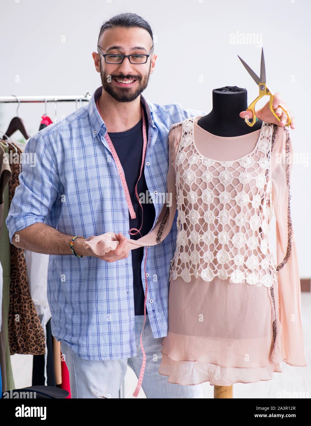 Tailor measuring blouse on mannequin hi-res stock photography and ...