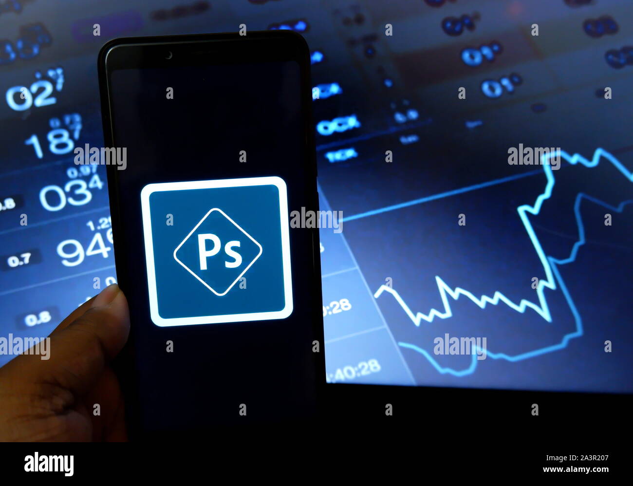In this photo illustration a popular technology company Adobe Photoshop ...