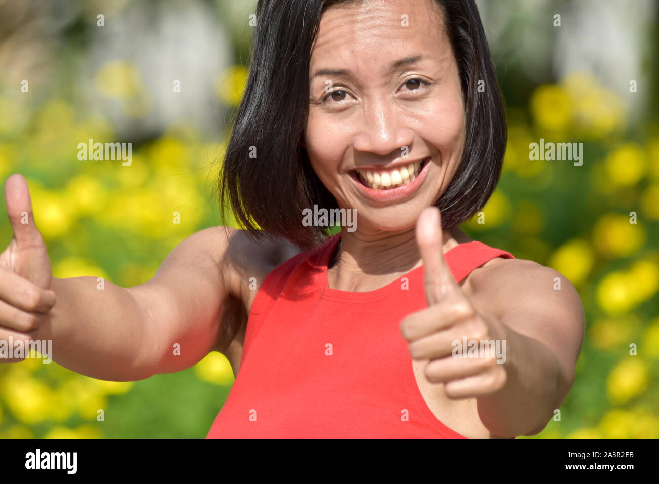 Female With Thumbs Up Stock Photo - Alamy