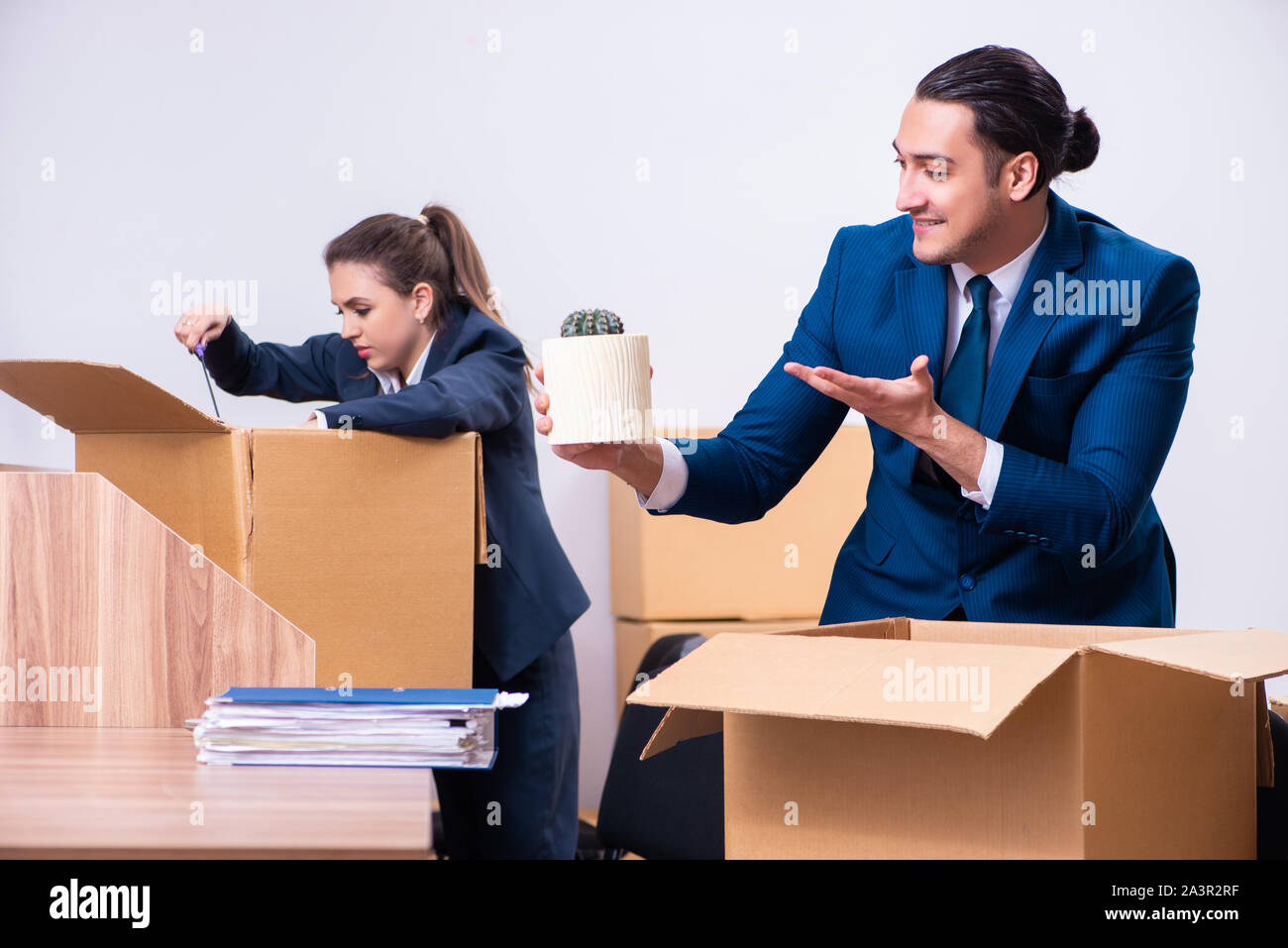 The two employees being fired from their work Stock Photo - Alamy
