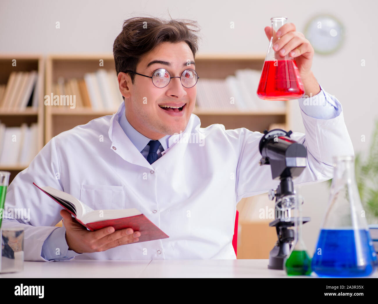 The mad crazy scientist doctor doing experiments in a laboratory Stock ...