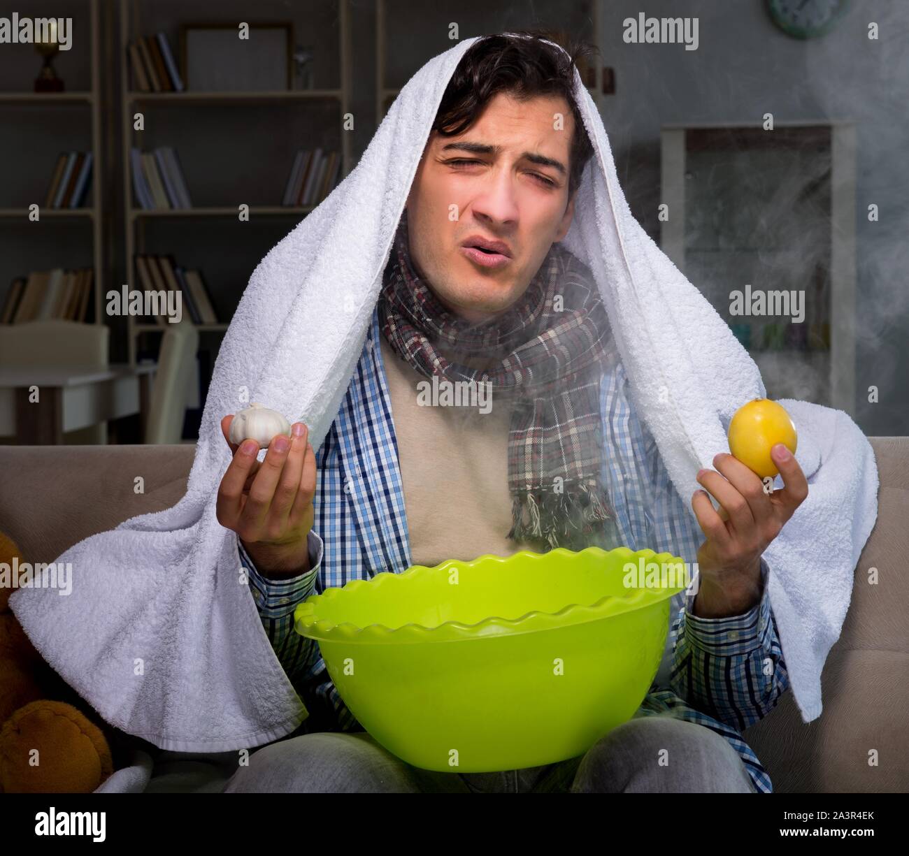 Sick man doing inhalation at night in home Stock Photo - Alamy