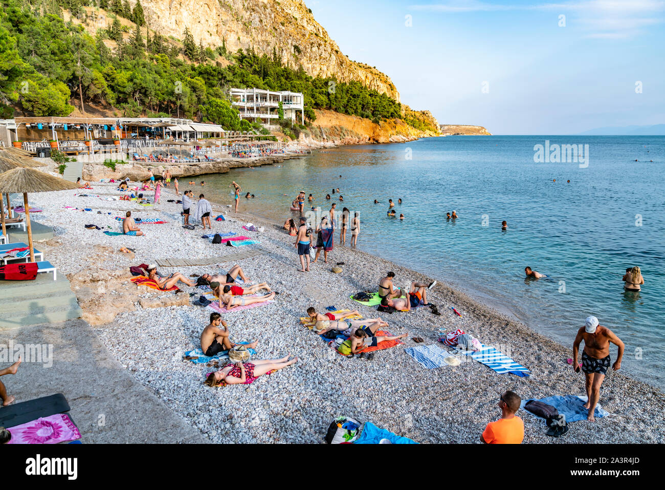 Nafplio Greece - July 19 2019; Beachgoers at Arvanitia Beach in Greece ...