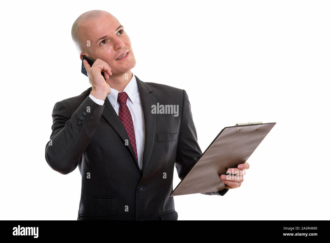 Handsome smiling bald man talking hi-res stock photography and images ...